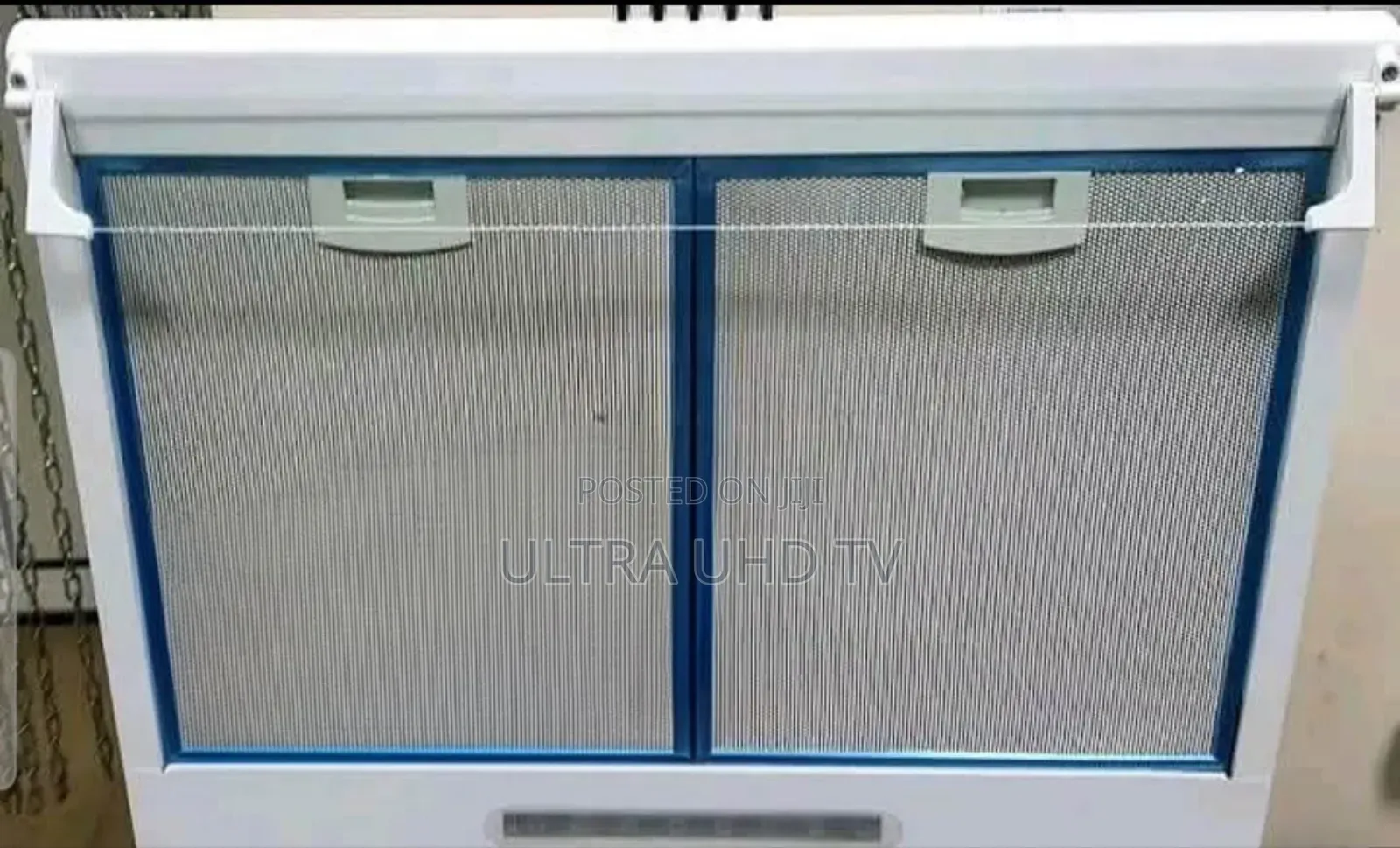 Kitchen Range Hood, Also Known as a Cooker Hood or Extractor Fan, in ...